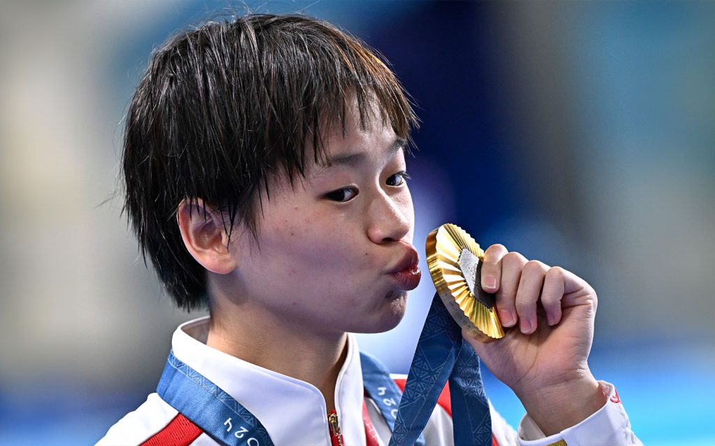 Teenage diver Quan Hongchan left in tears after being mobbed by fans in ...