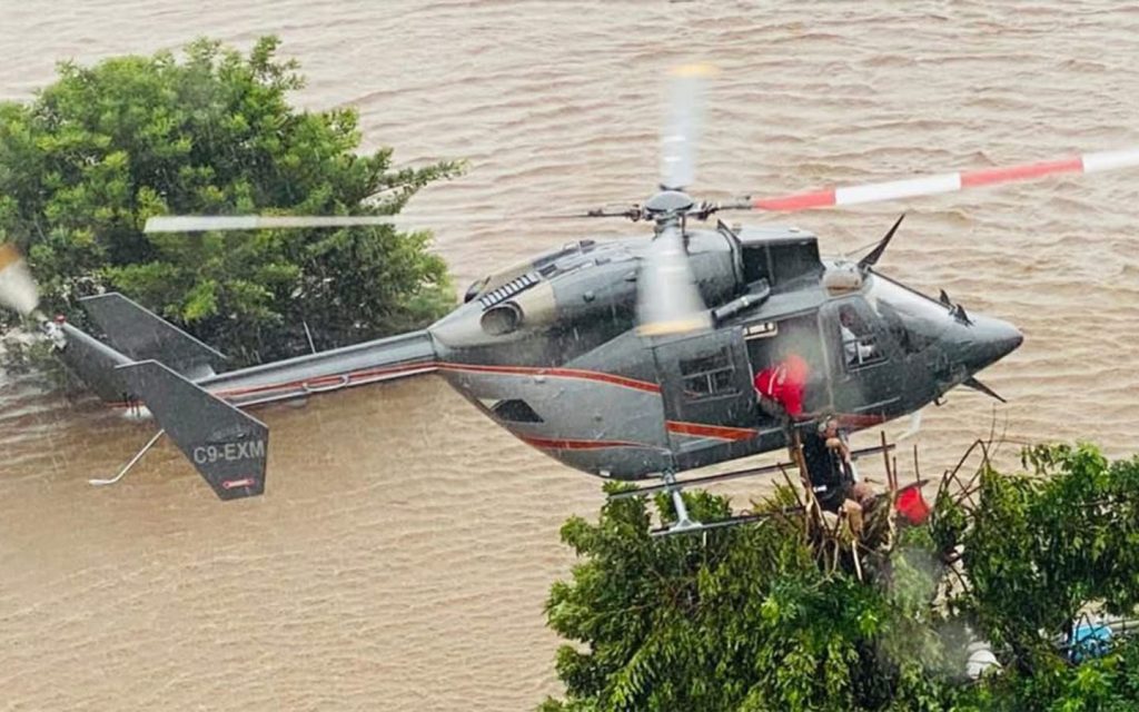Flood waters inundate Mozambique, forcing thousands to flee